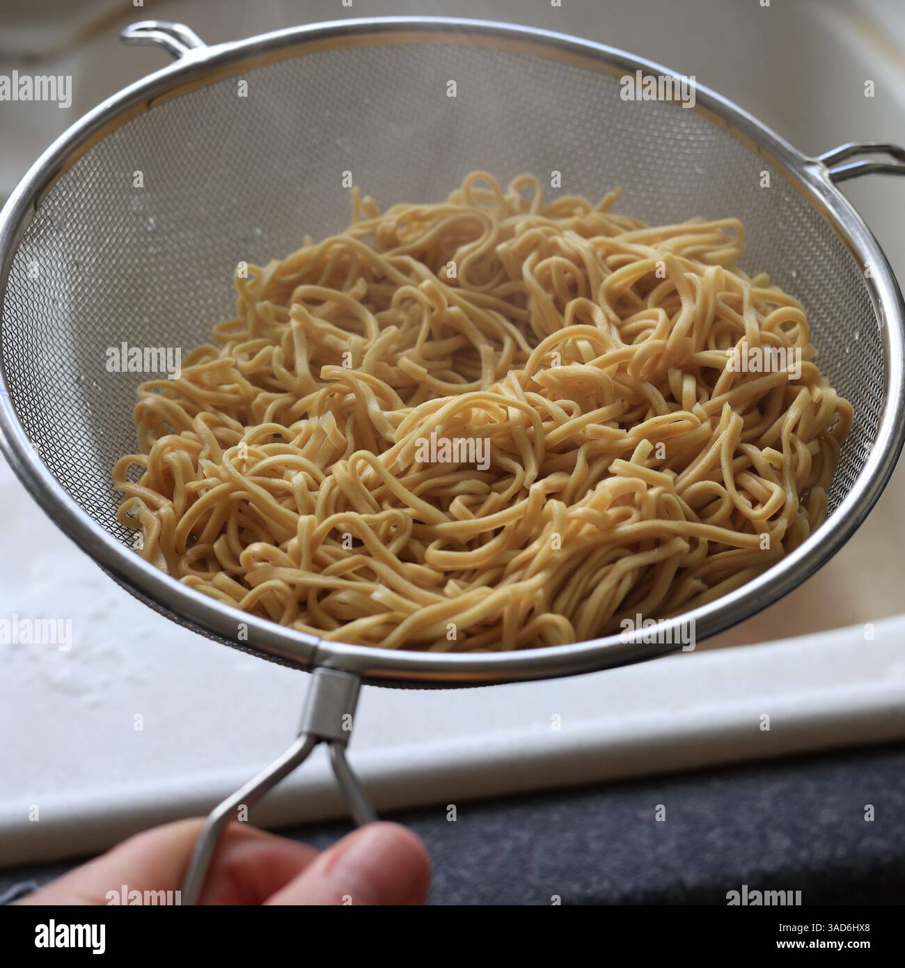 cooking noodles with seafood Stock Photo - Alamy