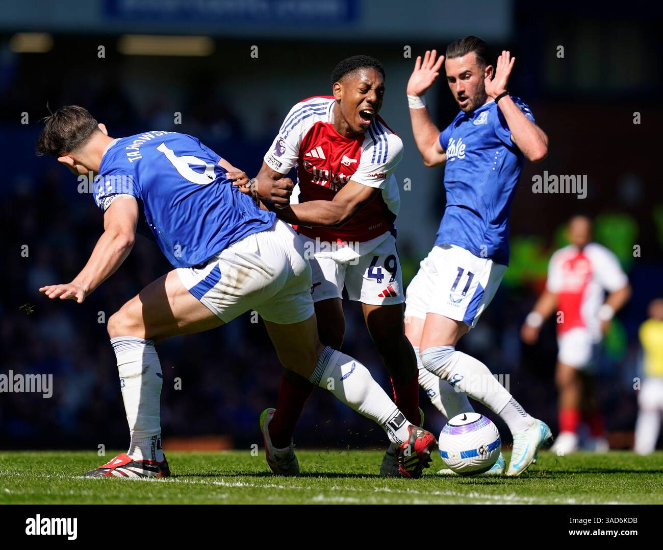 Liverpool, UK. 5th Apr, 2025. Myles Lewis-Skelly of Arsenal tackled by ...