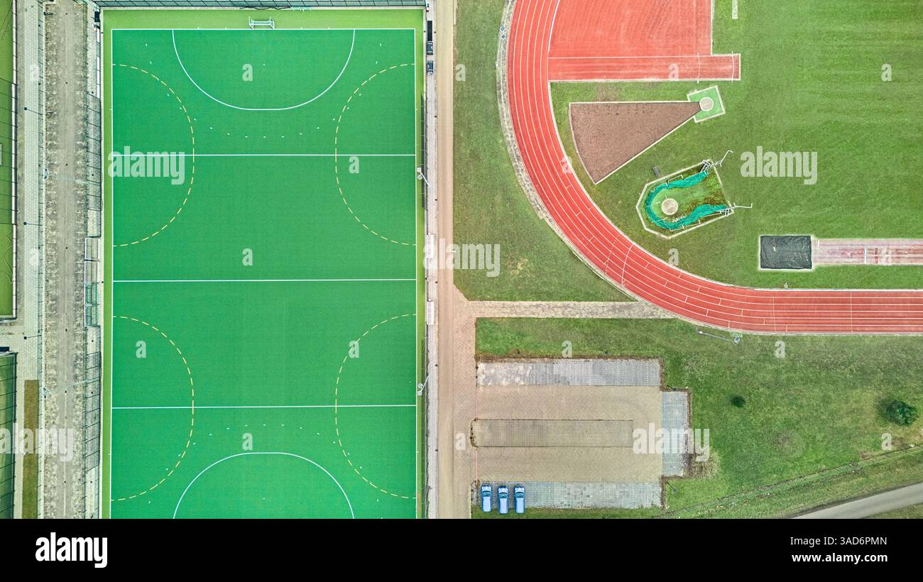 Sportpark with soccer fields and running track aerial drone view from ...