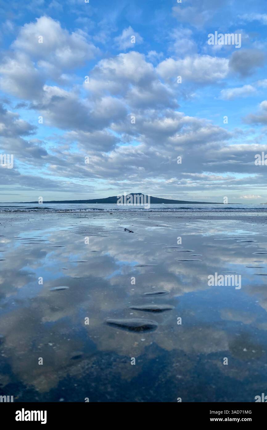 Clear weather over Rangitoto Island, Auckland. Low tide reveals ...