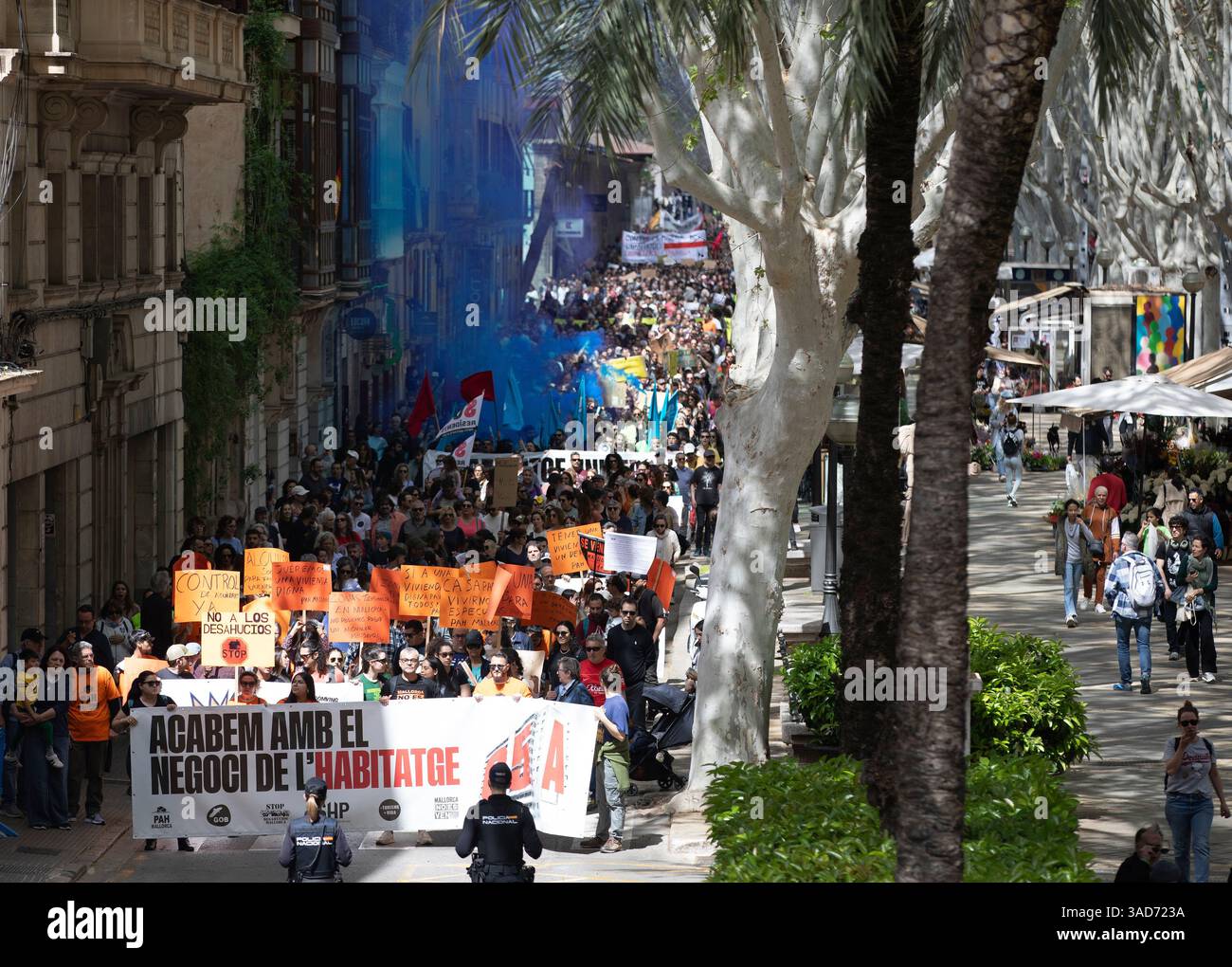 05 April 2025, Spain, Palma: People demonstrate against the increasing ...