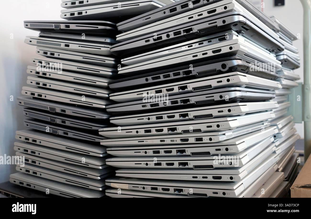 Electronic waste - stack of laptops to be discarded Stock Photo - Alamy