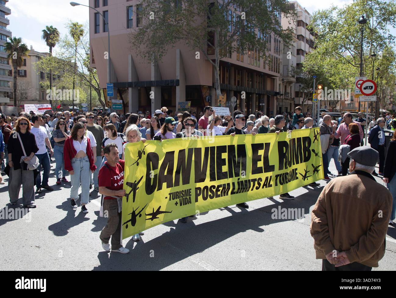 05 April 2025, Spain, Palma: People demonstrate against the increasing ...