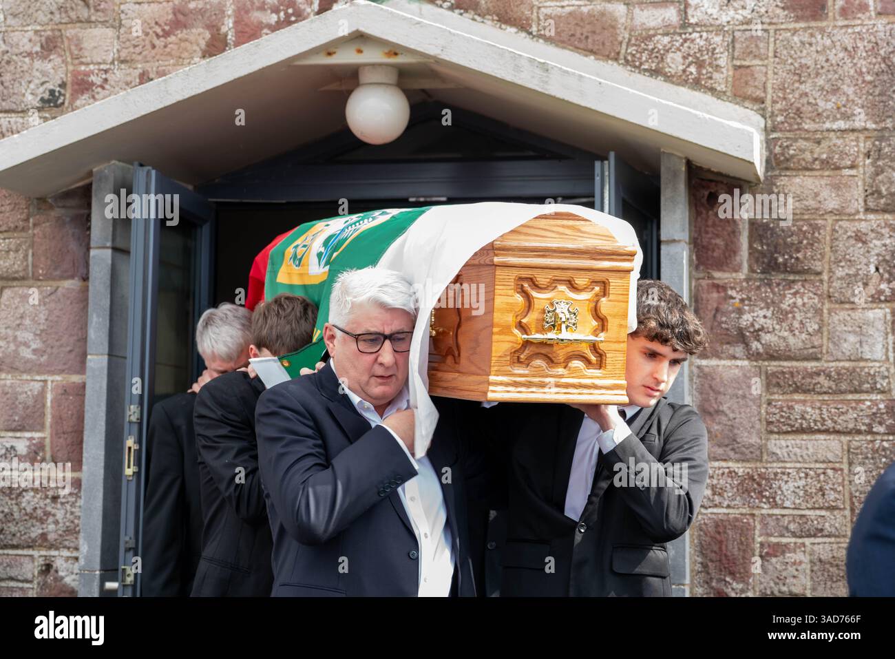 John O'Dwyer and Dylan O'Dwyer carrying the coffin of GAA Hall of Fame ...