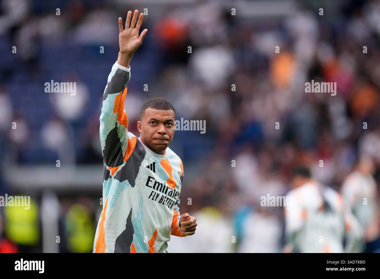 Real Madrid's Kylian Mbappe waves prior to a Spanish La Liga soccer ...