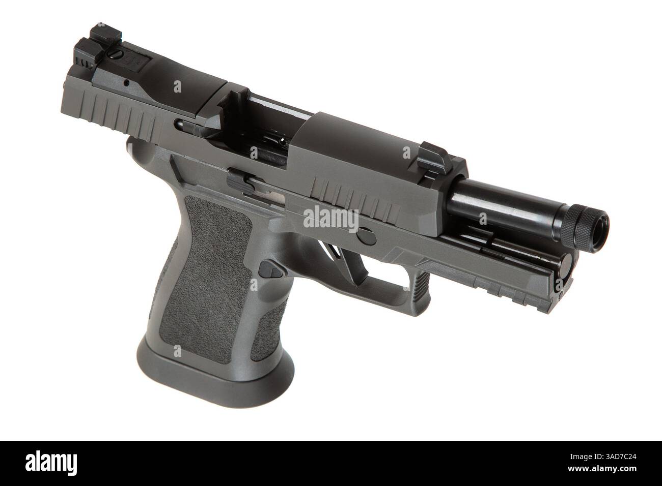 A close-up of a modern semi-automatic pistol with a textured grip ...