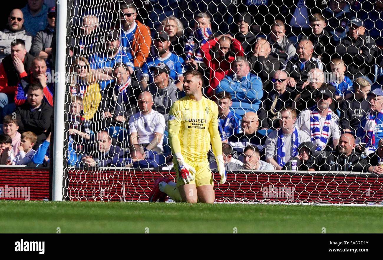 Rangers goalkeeper Jack Butland looks dejected after conceding the ...