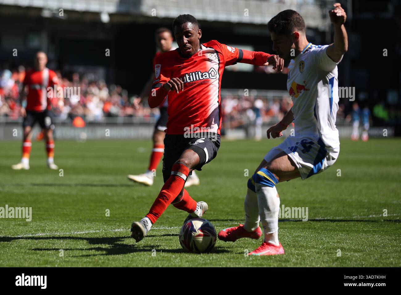 Luton Town's Amari'i Bell battles for the ball against Leeds United's ...