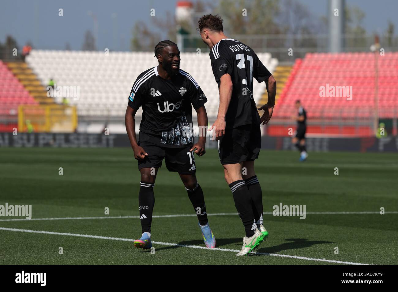 Monza, Italy. 5th Apr, 2025. Mergim Vojvoda of Como 1907 celebrates ...