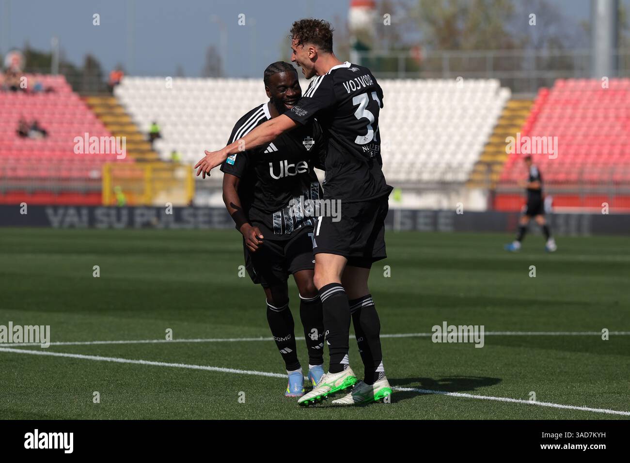 Monza, Italy. 5th Apr, 2025. Mergim Vojvoda of Como 1907 celebrates ...