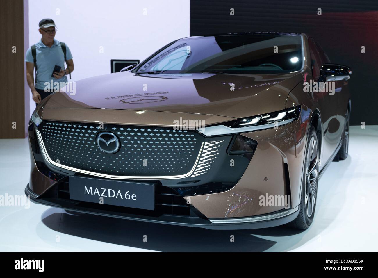 Bangkok, Thailand. 05th Apr, 2025. A visitor inspects a Mazda 6e car during the 46th Bangkok ...