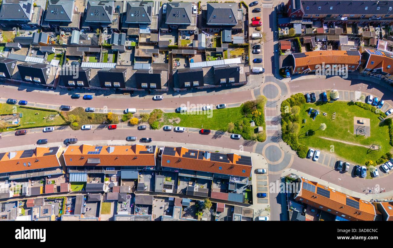 Explore a vibrant Dutch suburban area showcasing newly built family ...