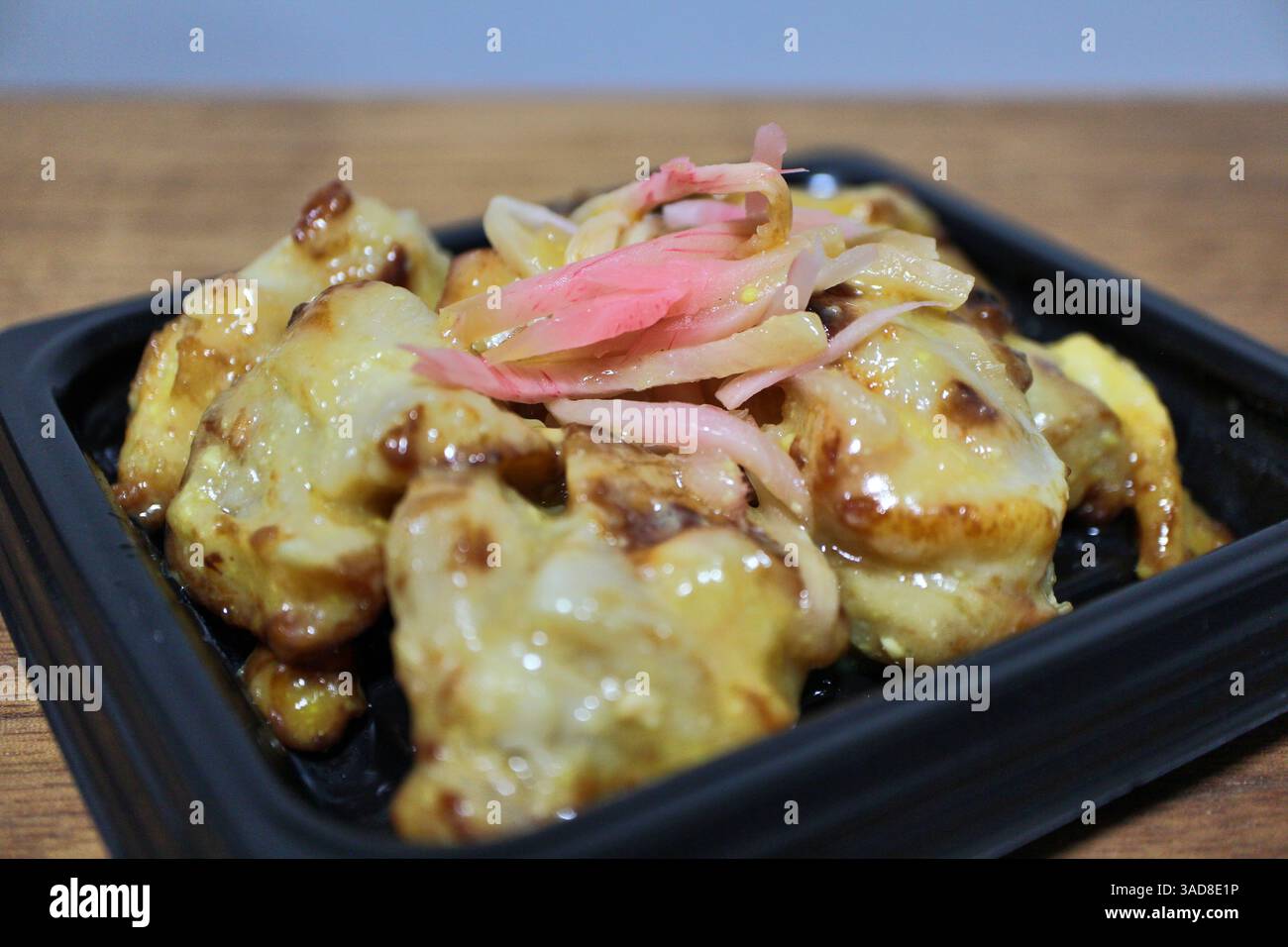 Chicken saikyo-yaki (grilled chicken with miso sauce) purchased at a ...