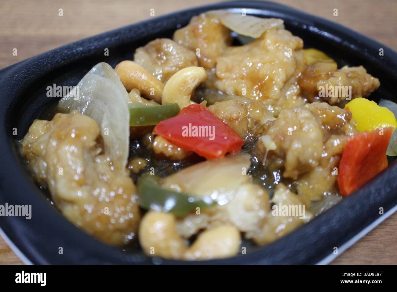 Stir-fried chicken and cashew nuts (Chinese food) purchased at a ...