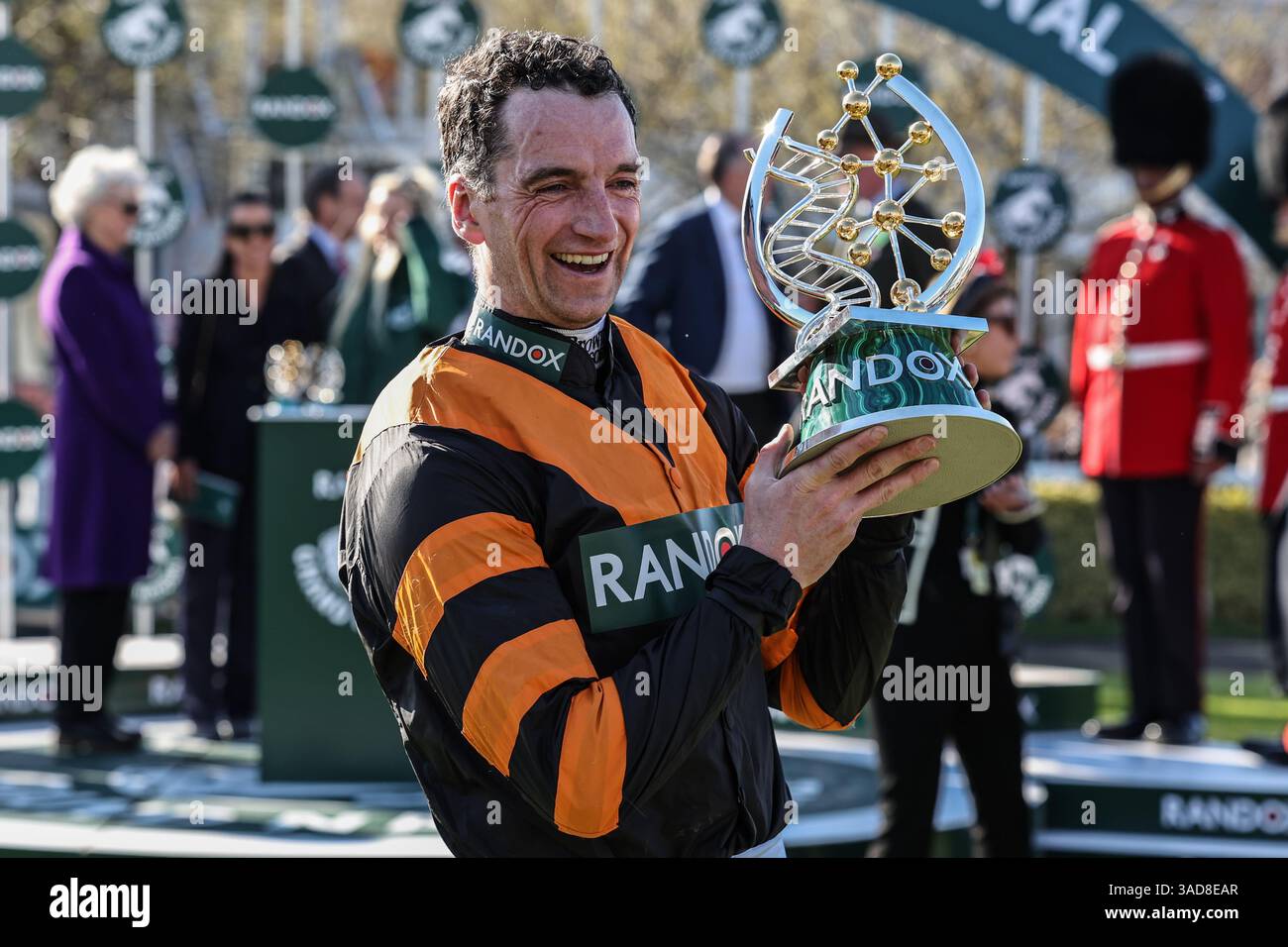 Patrick Mullins lifts the Grand National Trophy during the Randox Grand ...