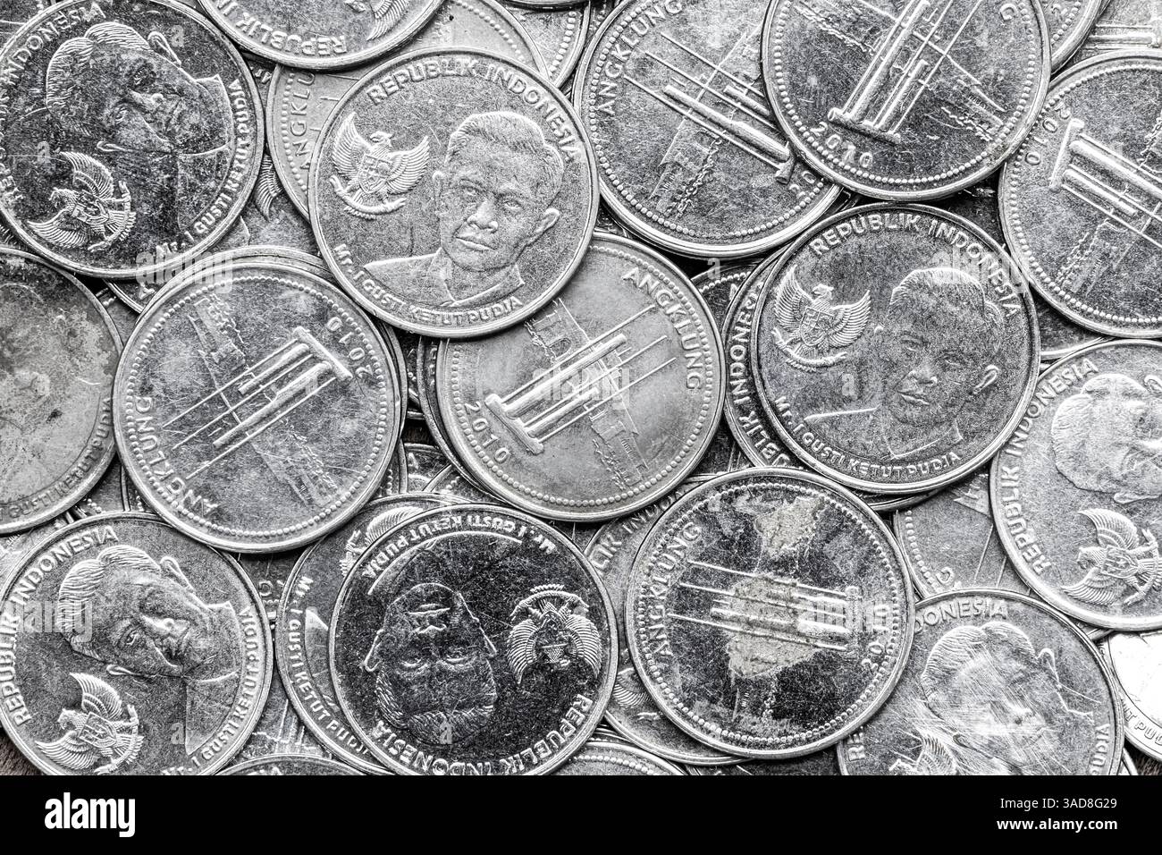 Pile of Indonesian 1000 Rupiah Coins. Reverse view of Indonesian Rupiah ...