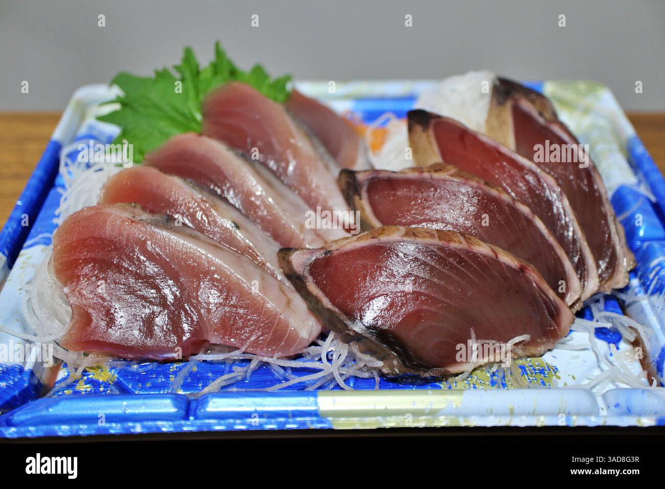 Katsuo tataki (seared bonito sashimi) and katsuo sashimi purchased at a ...