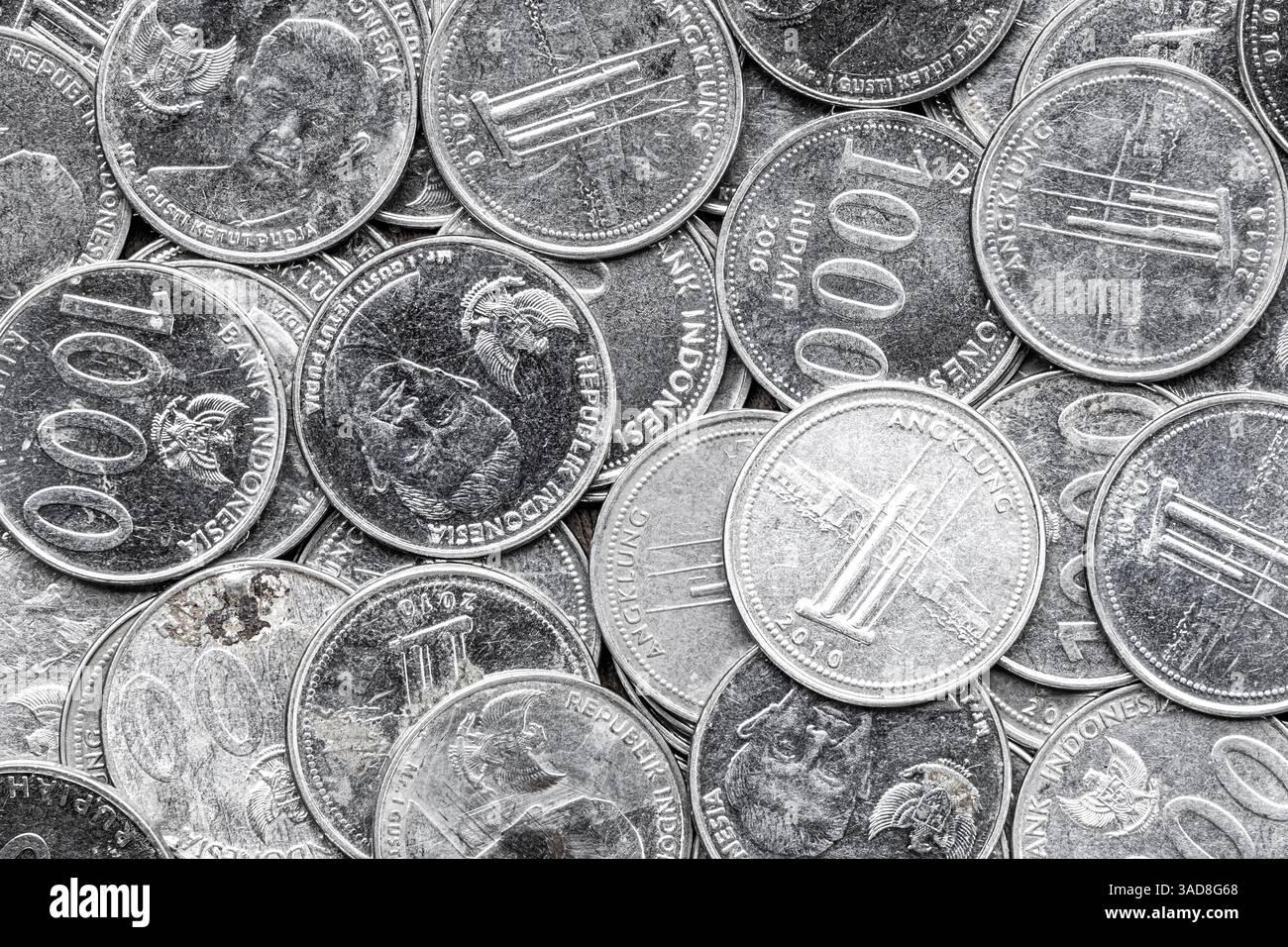Indonesian Rupiah Coins Close-Up. Pile of Indonesian 1000 Rupiah Coins ...