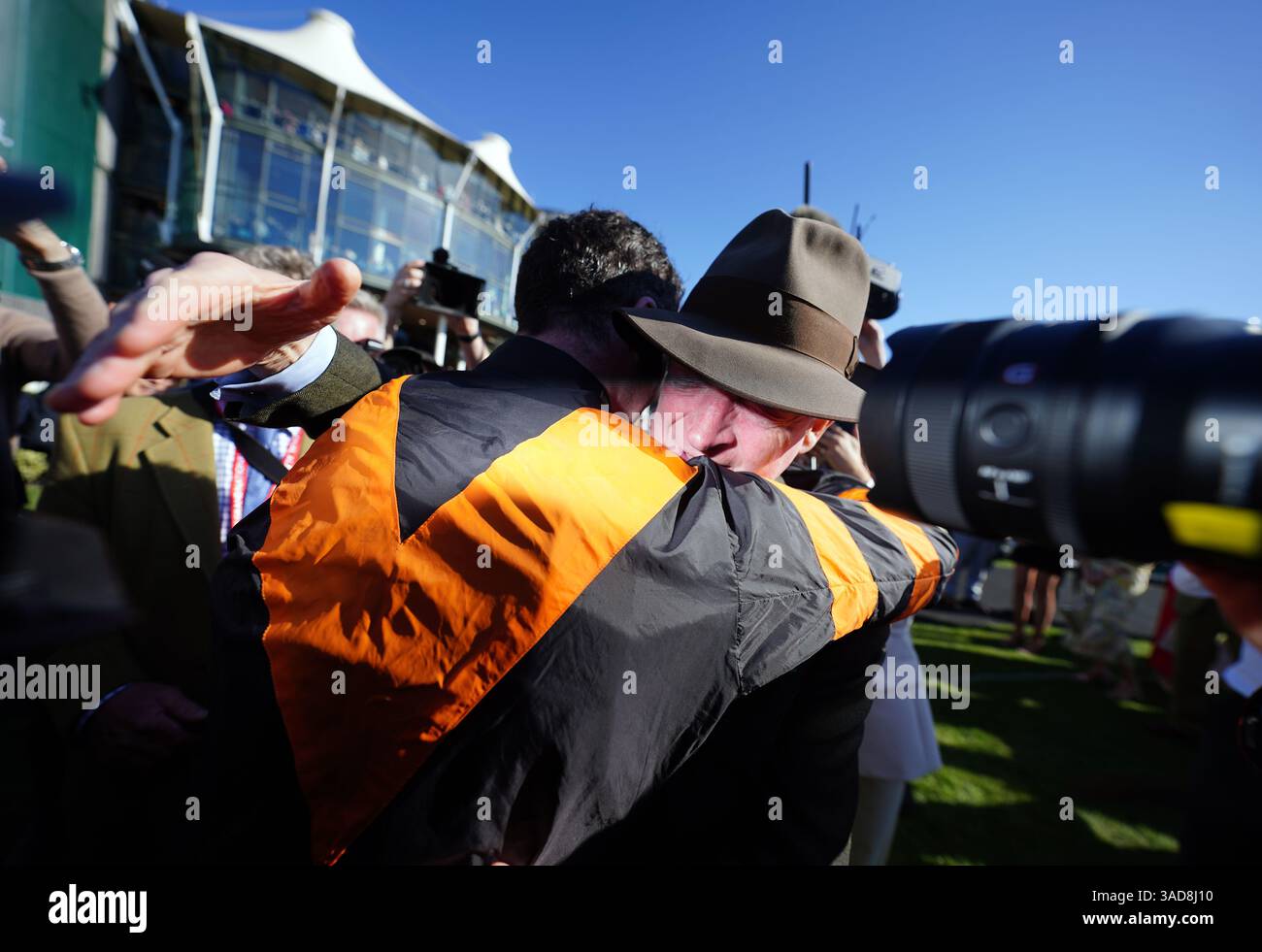 Jockey Patrick Mullins with his father and winning trainer Willie ...