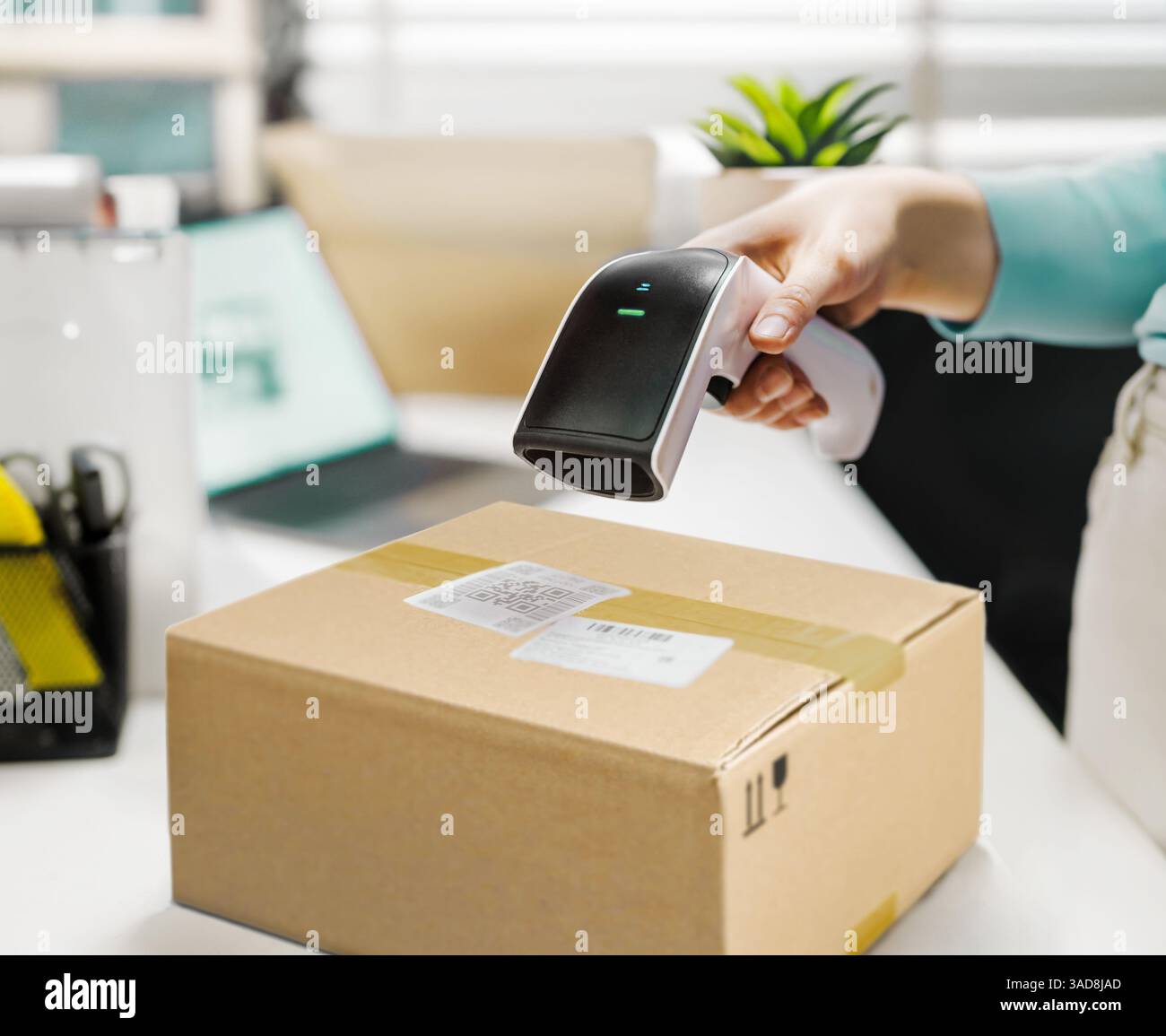 Modern workspace of the online order pick-up point. Employee is ...