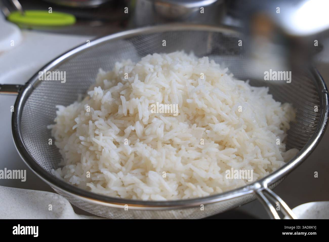 white rice boiled in colander Stock Photo - Alamy