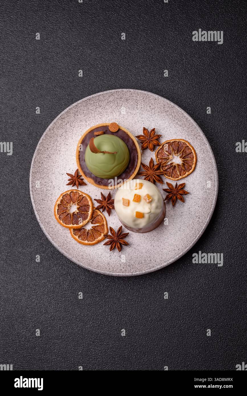 Easter sweet cake covered with icing with fruit and candied fruits ...