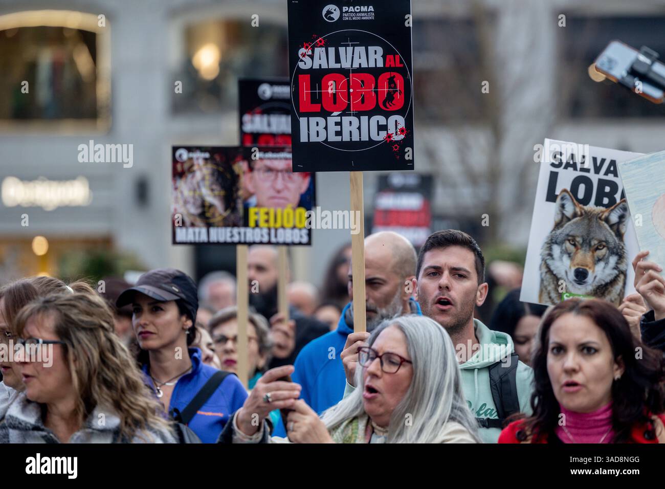 Several people show posters during the rally 'Save the Iberian wolf ...