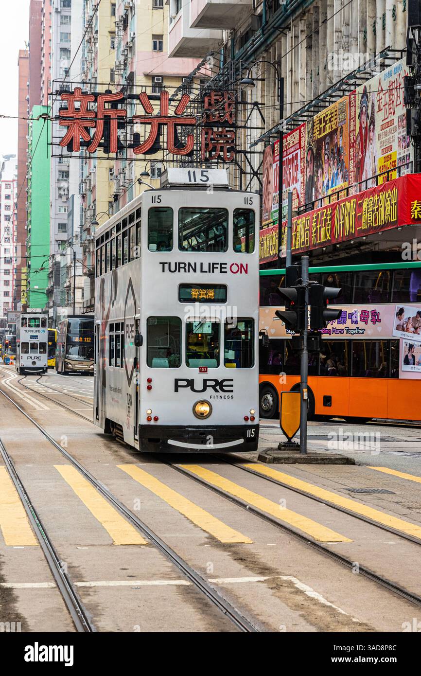 A typical Hong Kong tram (Ding Ding) in Kings Road, Hong Kong Island ...