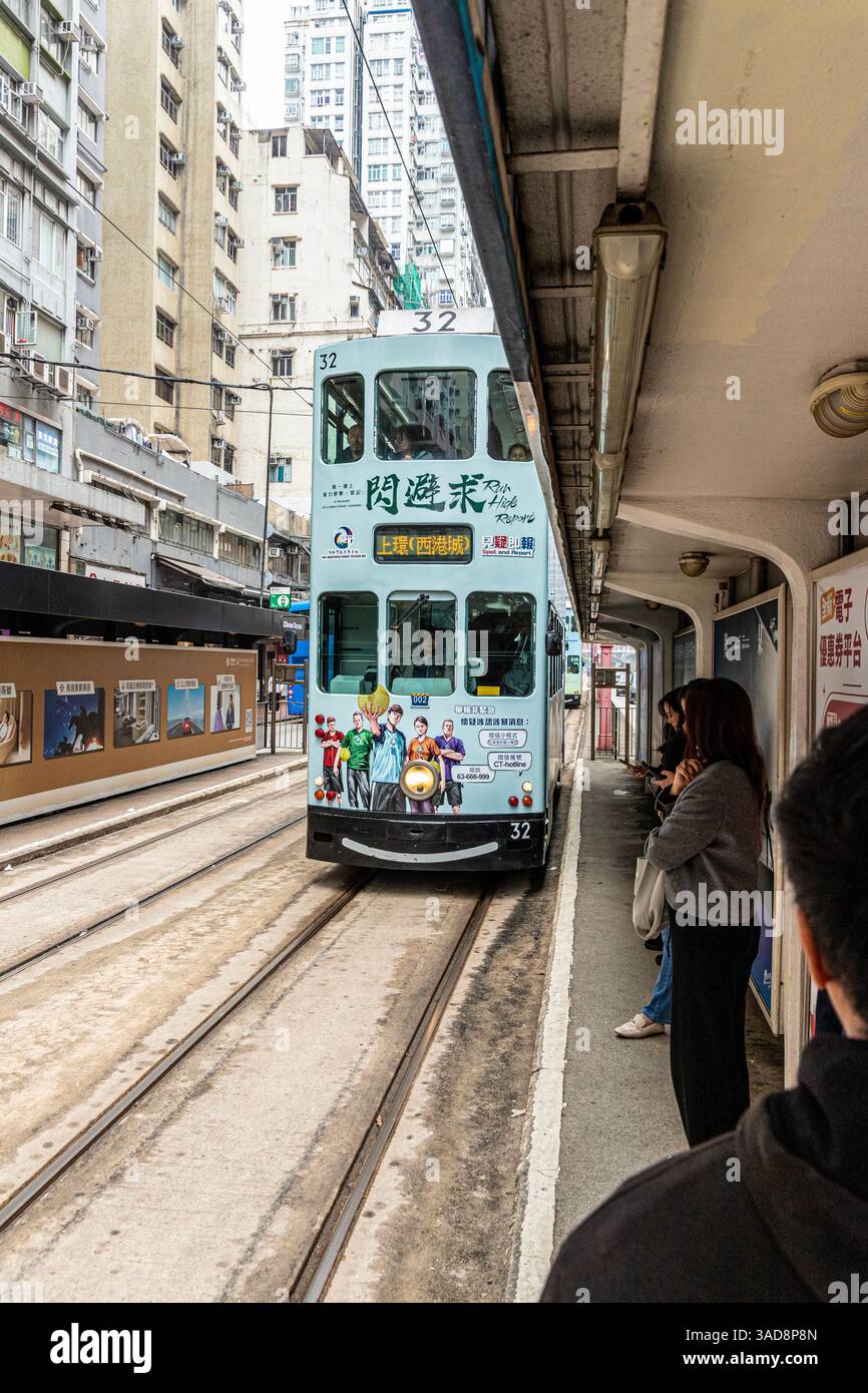 A typical Hong Kong tram (Ding Ding) in Kings Road, Hong Kong Island ...