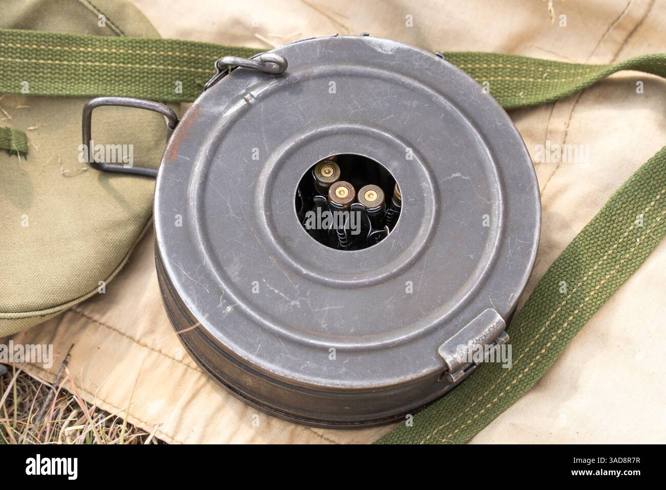 WWII Soviet PPS submachine gun with visible drum magazine and bullets ...