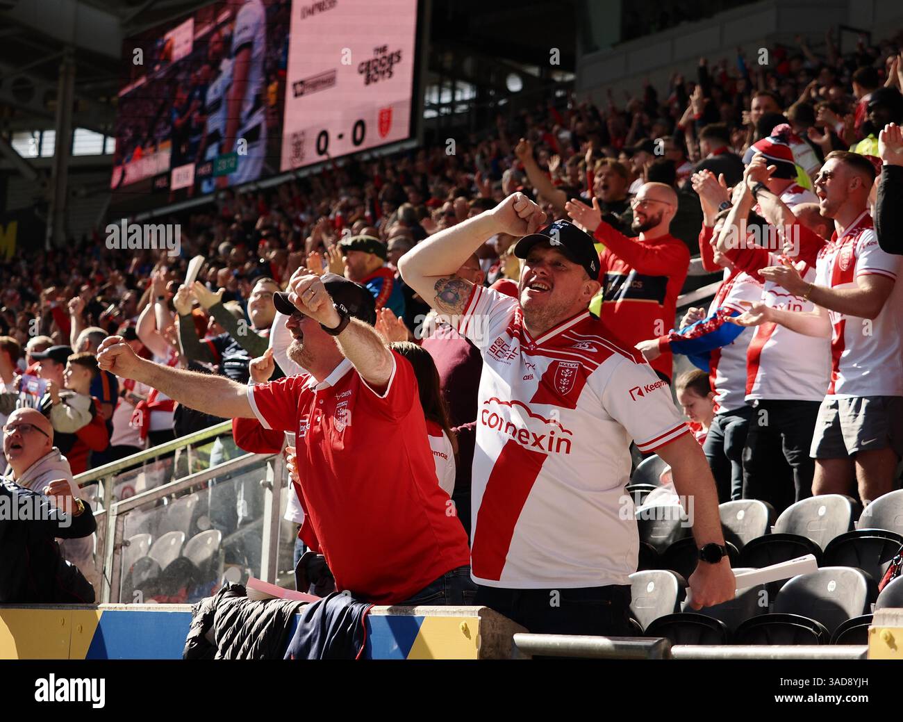 Two Hull K.R. fans celebrate after a try during the Betfred Challenger ...