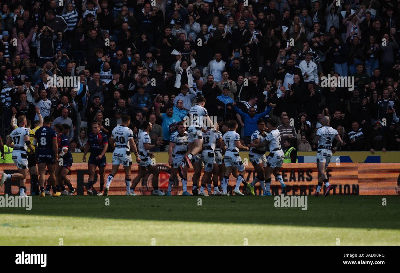Hull F.C. players celebrate after scoring a try during the Betfred ...