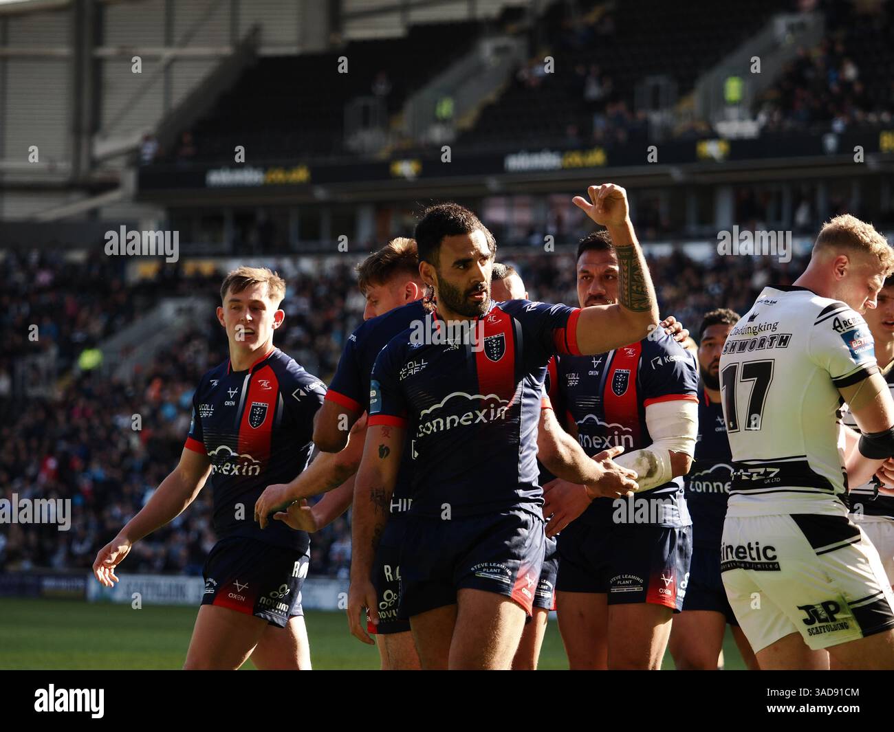 Hull K.R. fans celebrate after a try which is later disallowed during ...