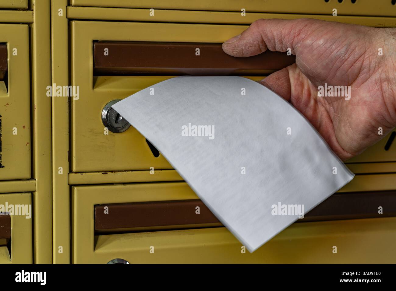 Yellow mailboxes in the stairwell of a block of flats, distribution of ...