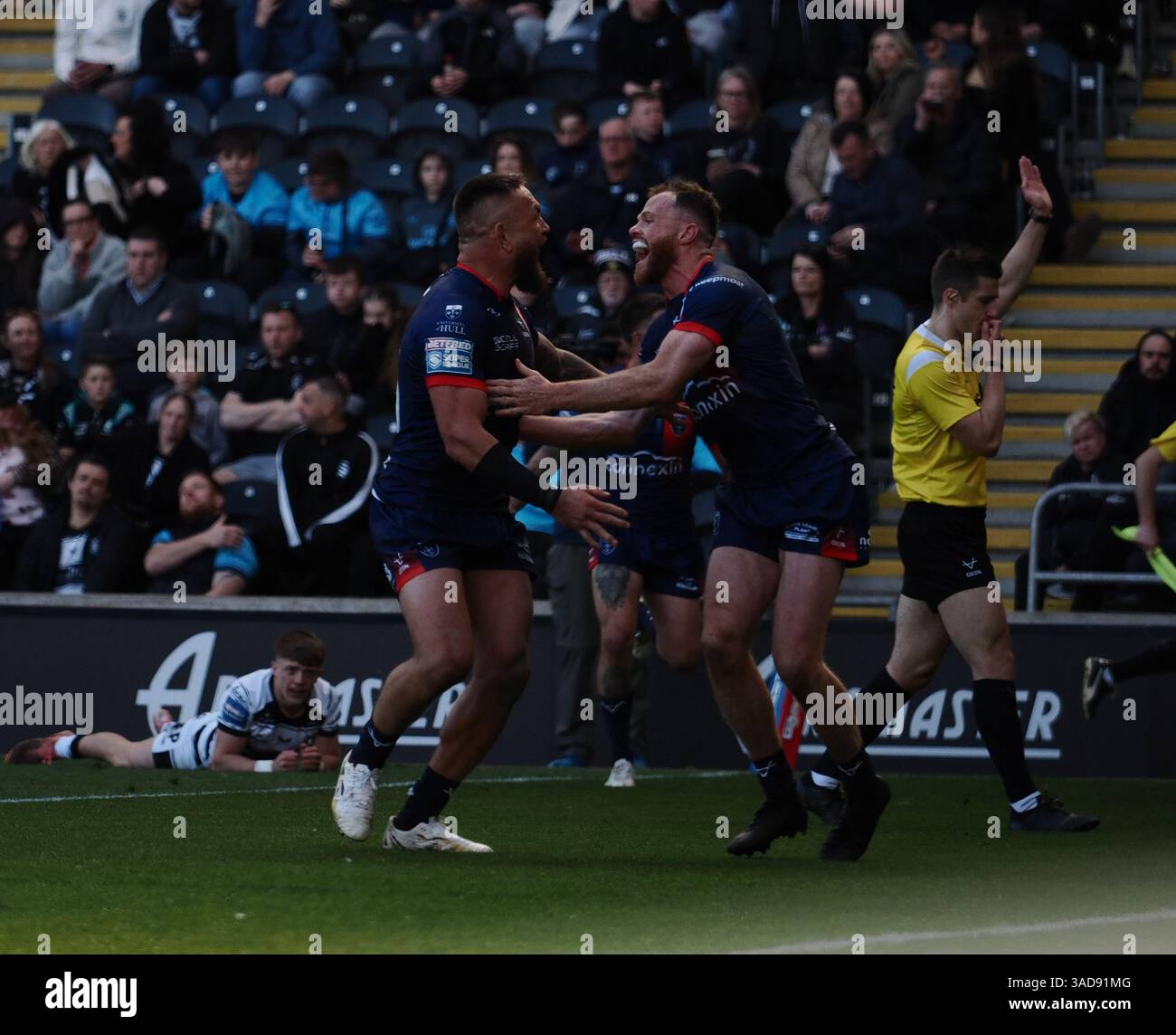 Two Hull K.R> players celbrate after they score a try during the ...