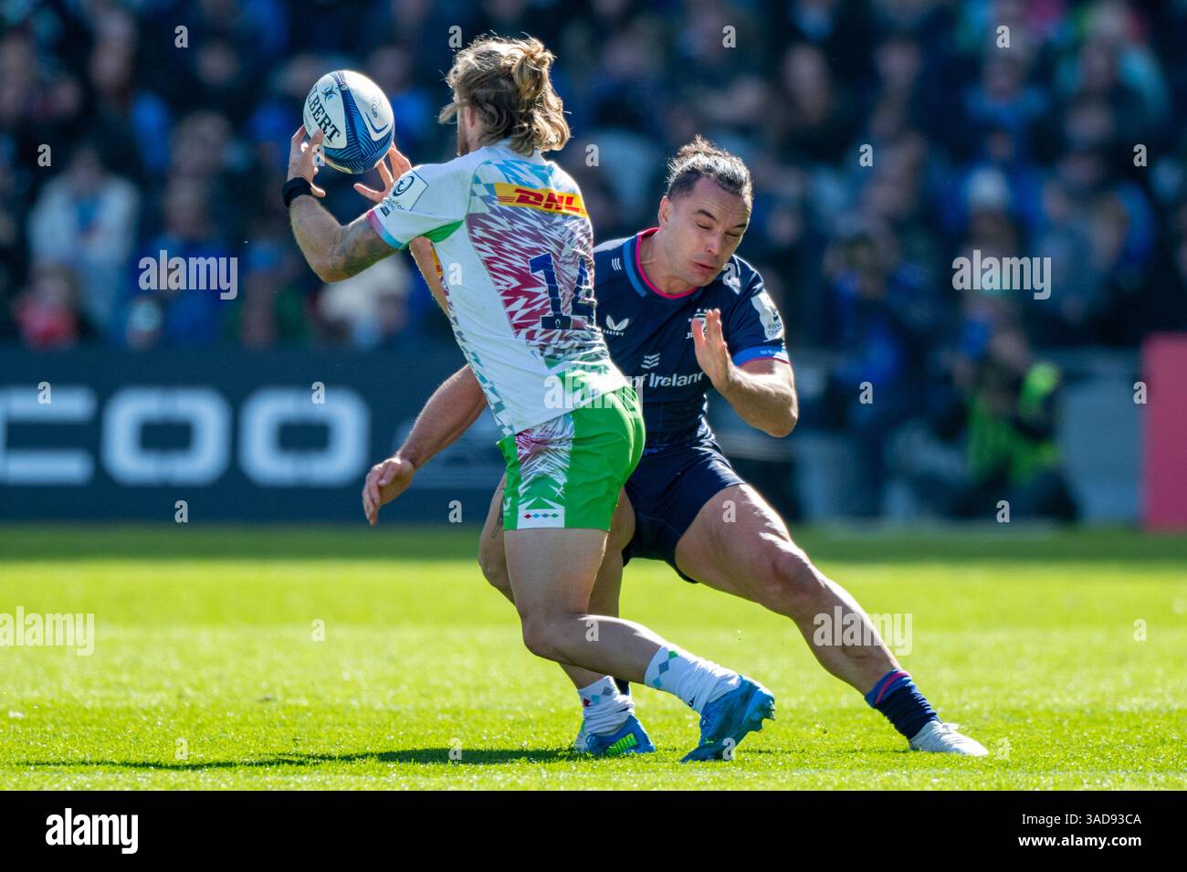 Dublin, Ireland. 05th Apr, 2025. Tyrone Green of Harlequins and James ...