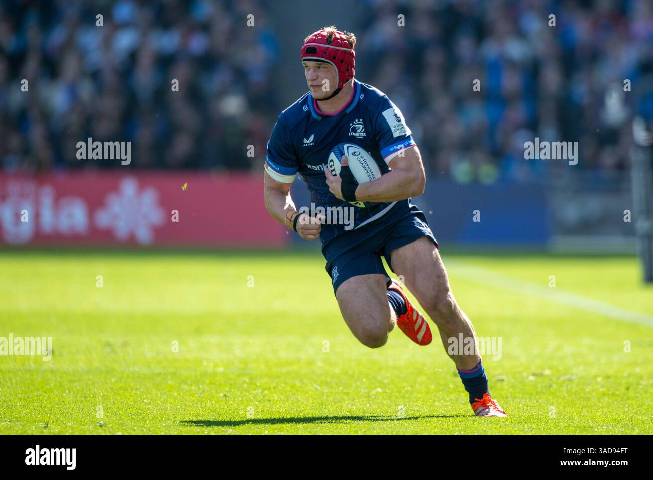 Josh van der Flier of Leinster runs with the ball during the Investec ...