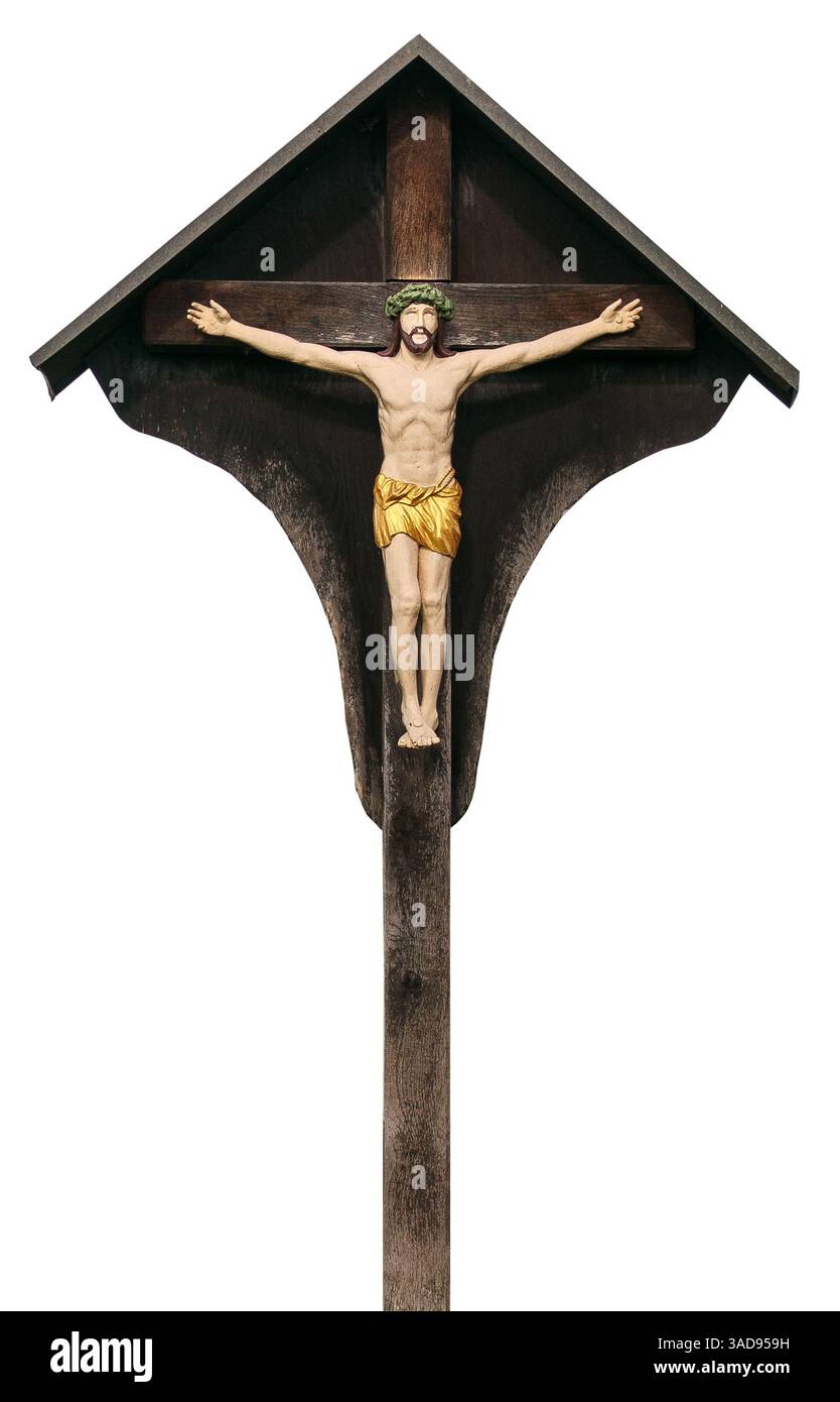 Isolated crucifix. Rustic wooden field cross with Jesus Christ, wearing ...