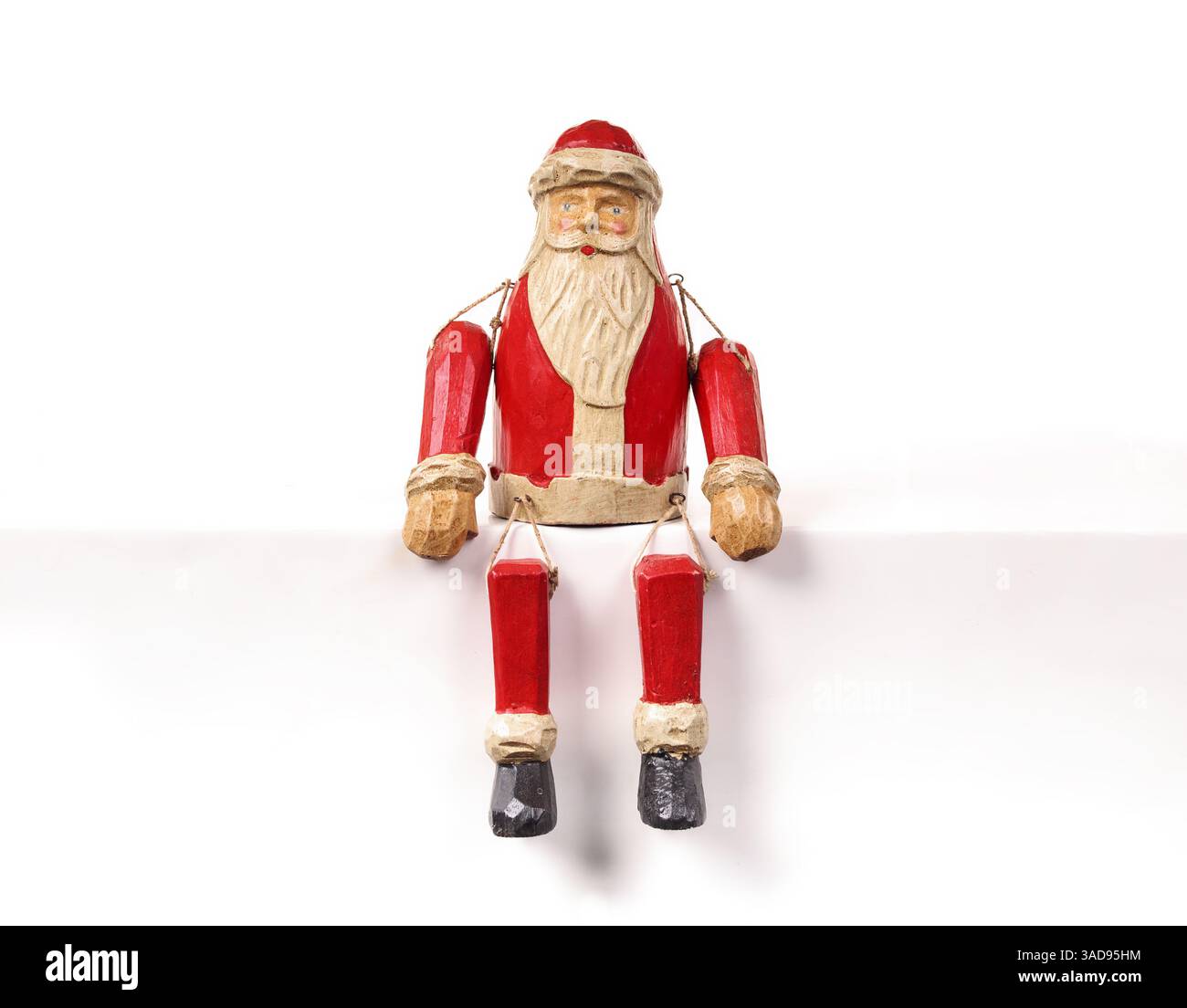 Vintage Santa sitting against white background. Portrait of vintage ...