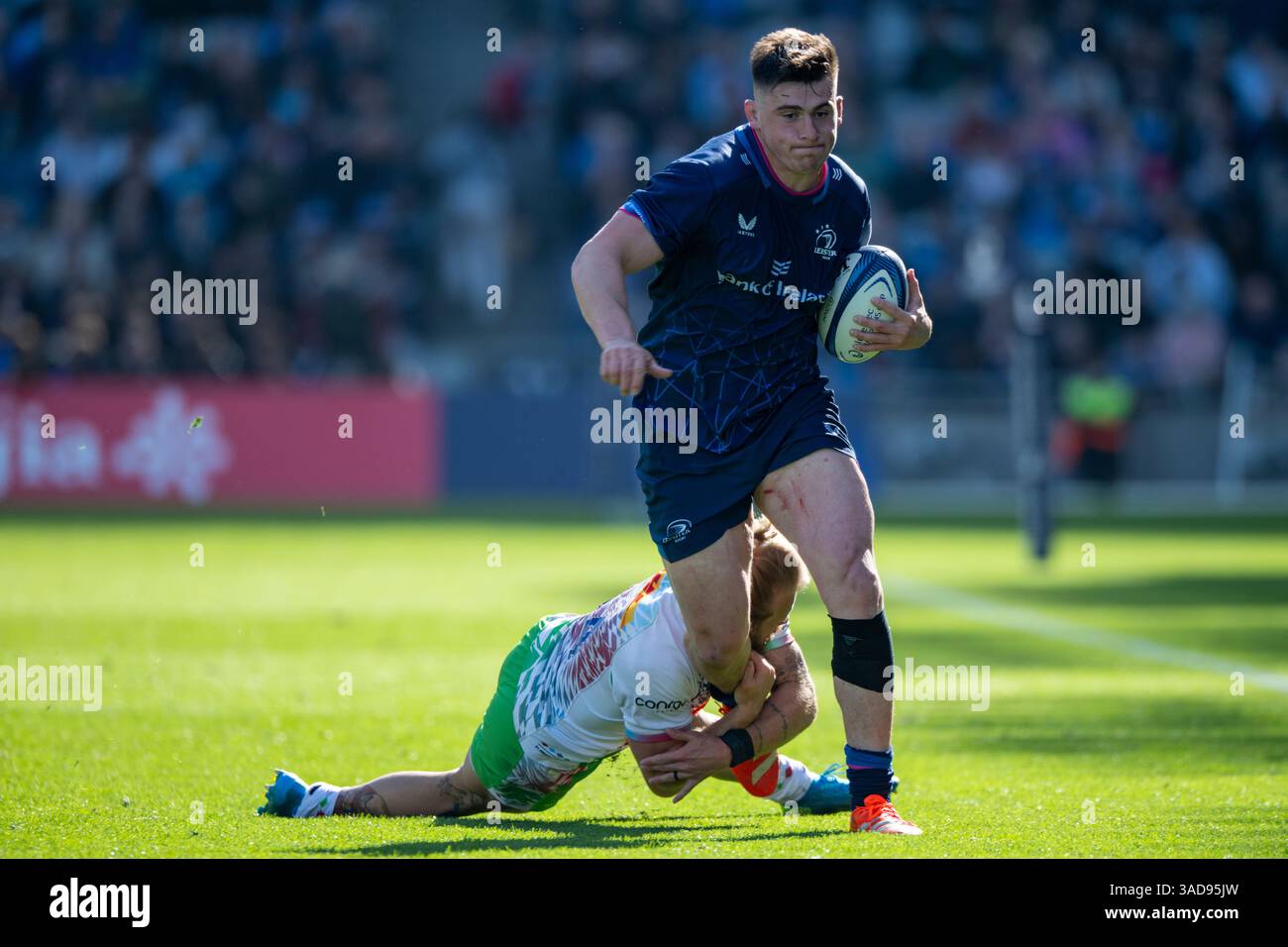 Dan Sheehan of Leinster tackled by Tyrone Green of Harlequins during ...