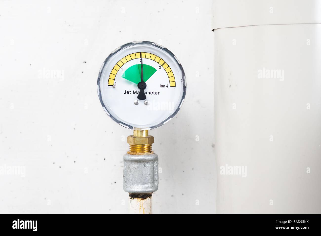Jet manometer in boiler room of building. Arrow is on green. Gauge ...