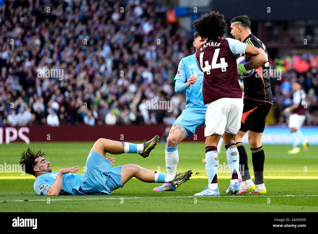 Nottingham Forest's Jota Silva (left) clashes with Aston Villa ...