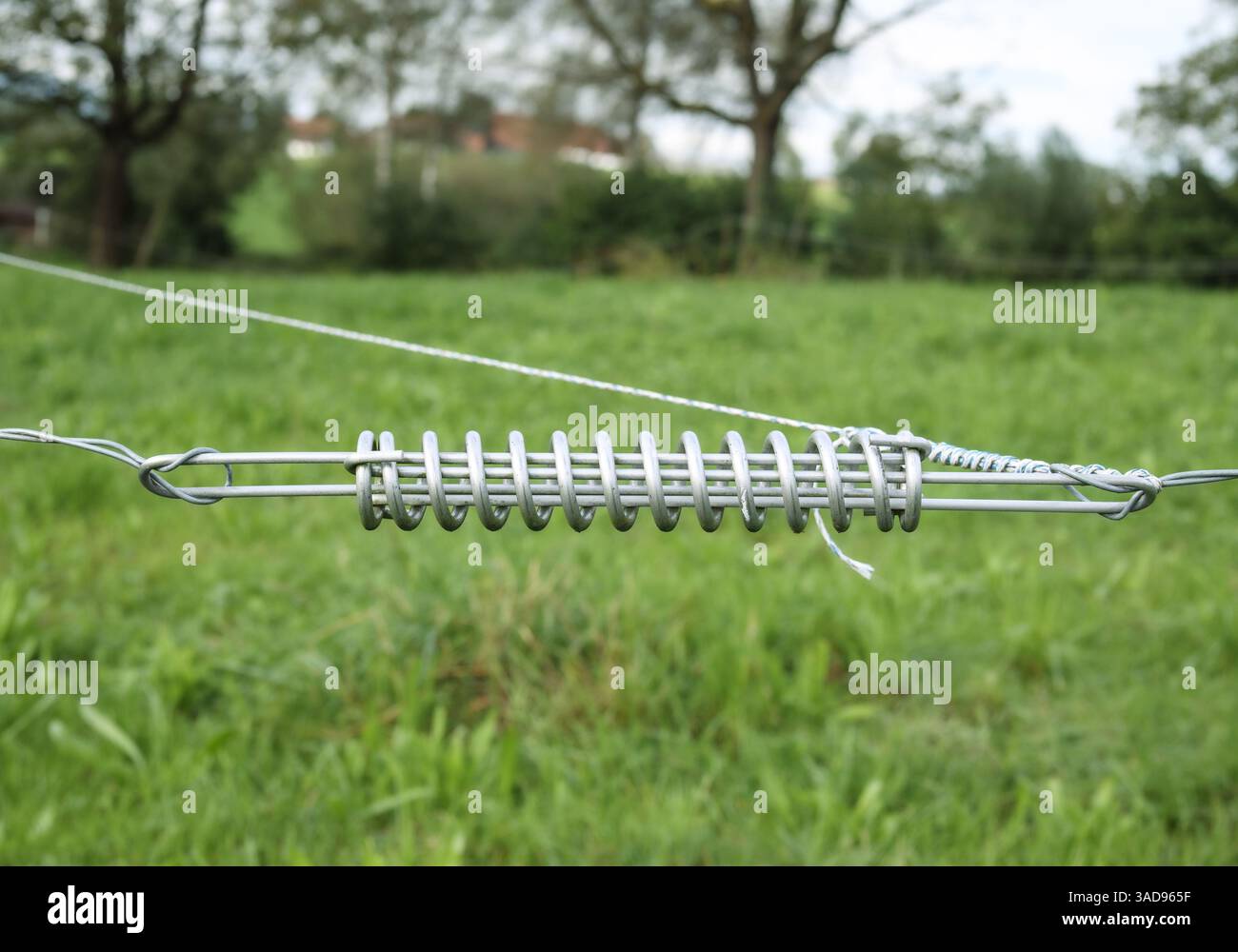 Electric fence tension spring for animal pasture. Heavy duty tension ...