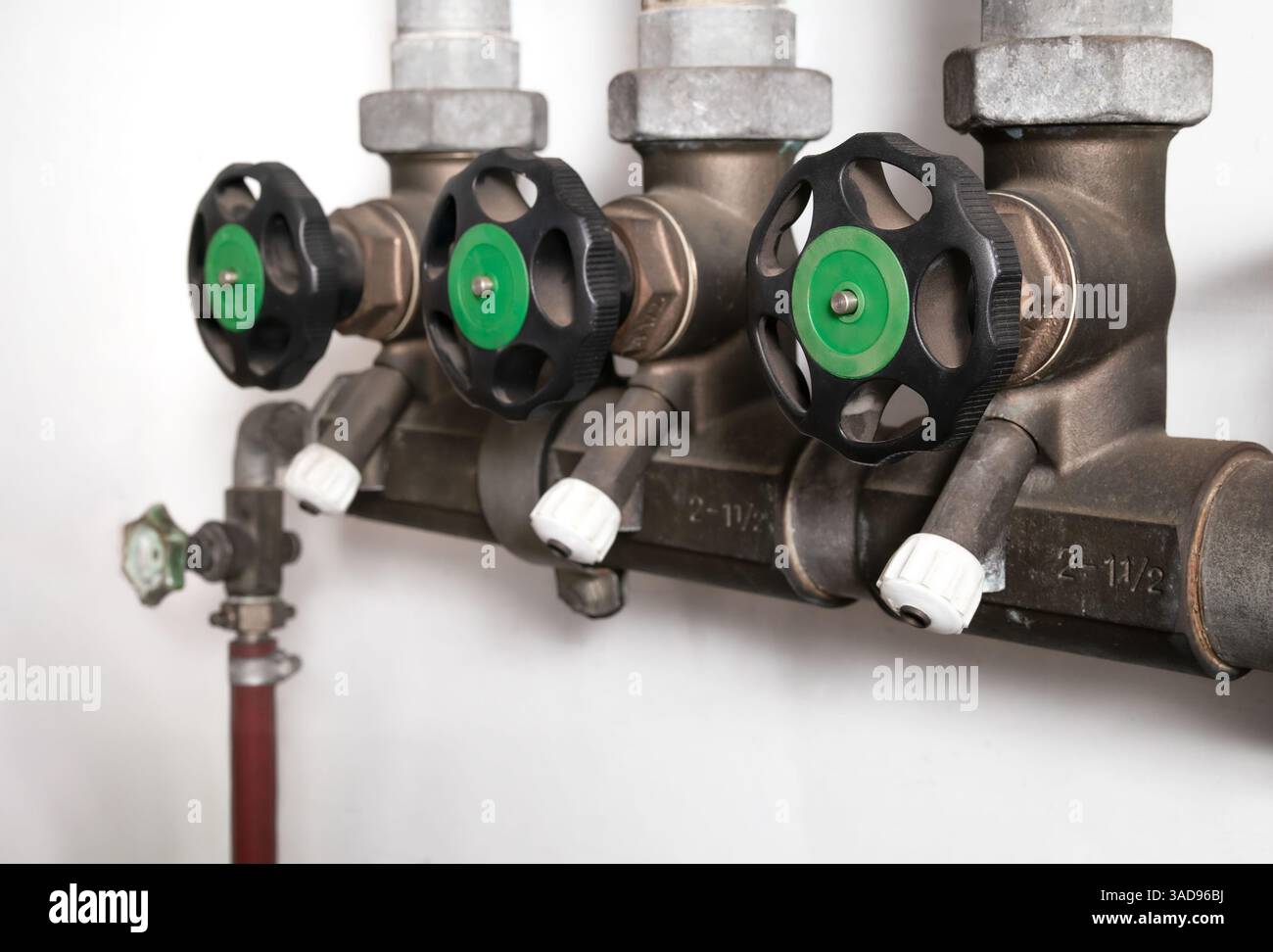 Backwater valve or backflow shut off valve in service room of building ...