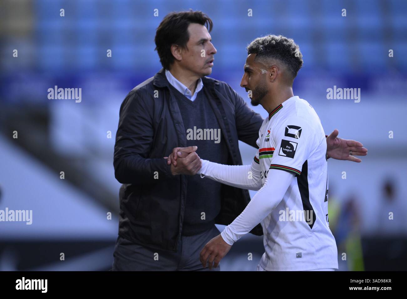 Westerlo, Belgium. 05th Apr, 2025. OHL's head coach Chris Coleman and OHL's Youssef Maziz ...