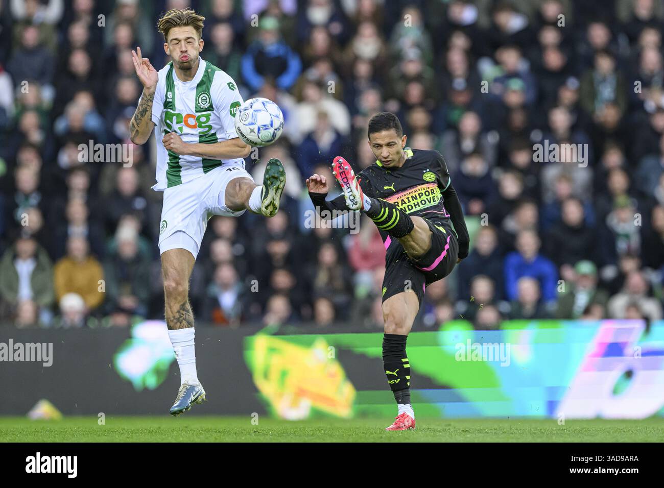 GRONINGEN - (l-r) Luciano Valente of FC Groningen, Mauro Junior of PSV ...