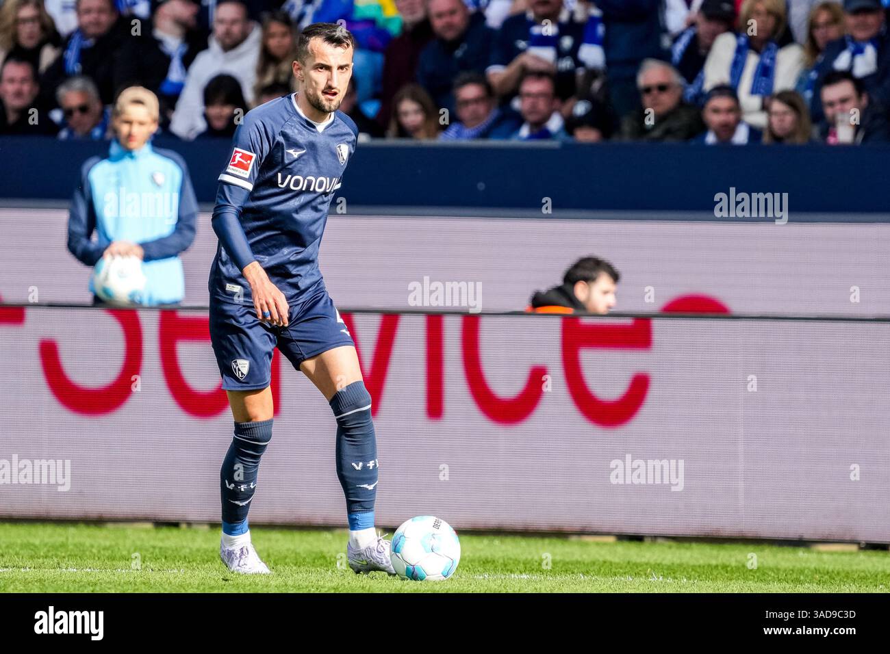 BOCHUM, GERMANY - APRIL 5: Erhan Masovic of VfL Bochum dribbles with ...