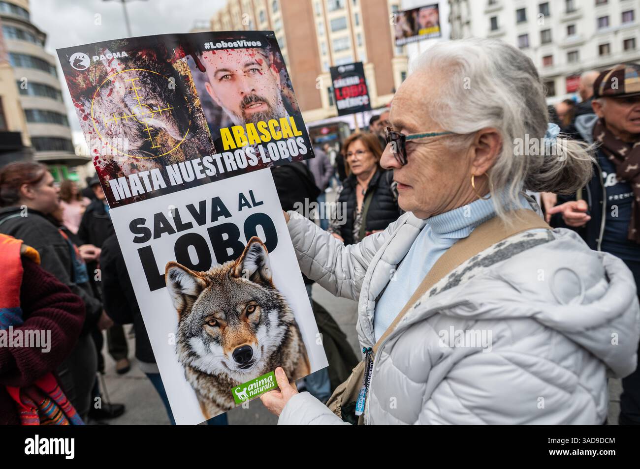 Madrid, Spain. 05th Apr, 2025. A woman holds a placard with the picture ...