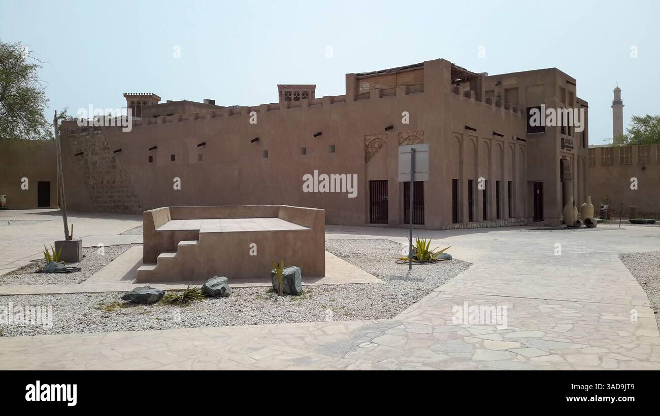 A traditional Middle Eastern building with a sandy exterior, featuring ...