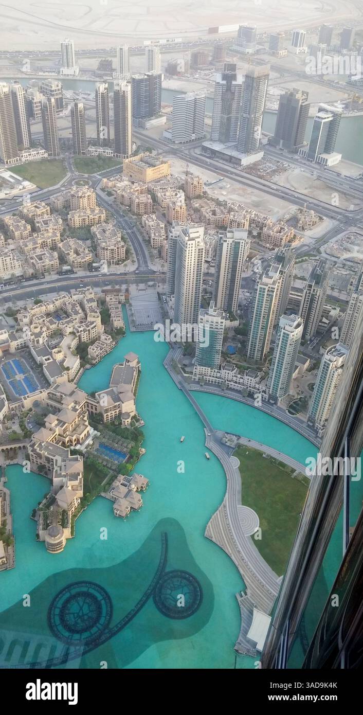 Aerial view of a modern cityscape featuring high-rise buildings, a ...